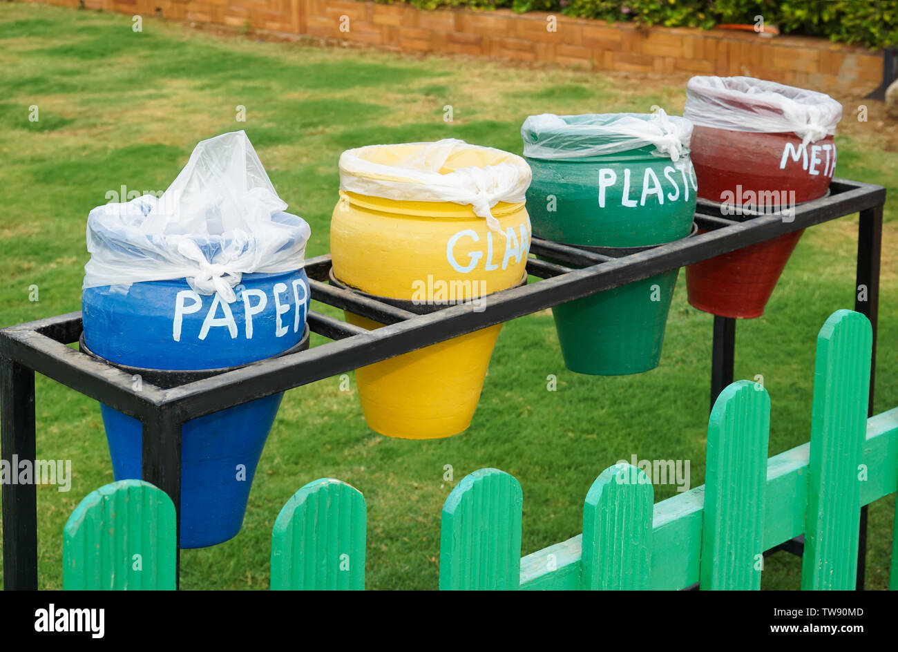 Different colorful trash bins outdoors. Recycling concept Stock Photo ...