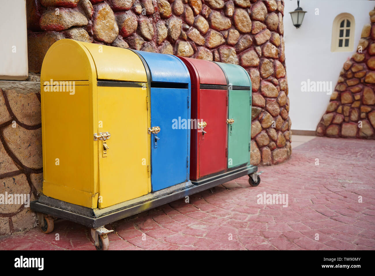 Different colorful trash bins outdoors. Recycling concept Stock Photo ...