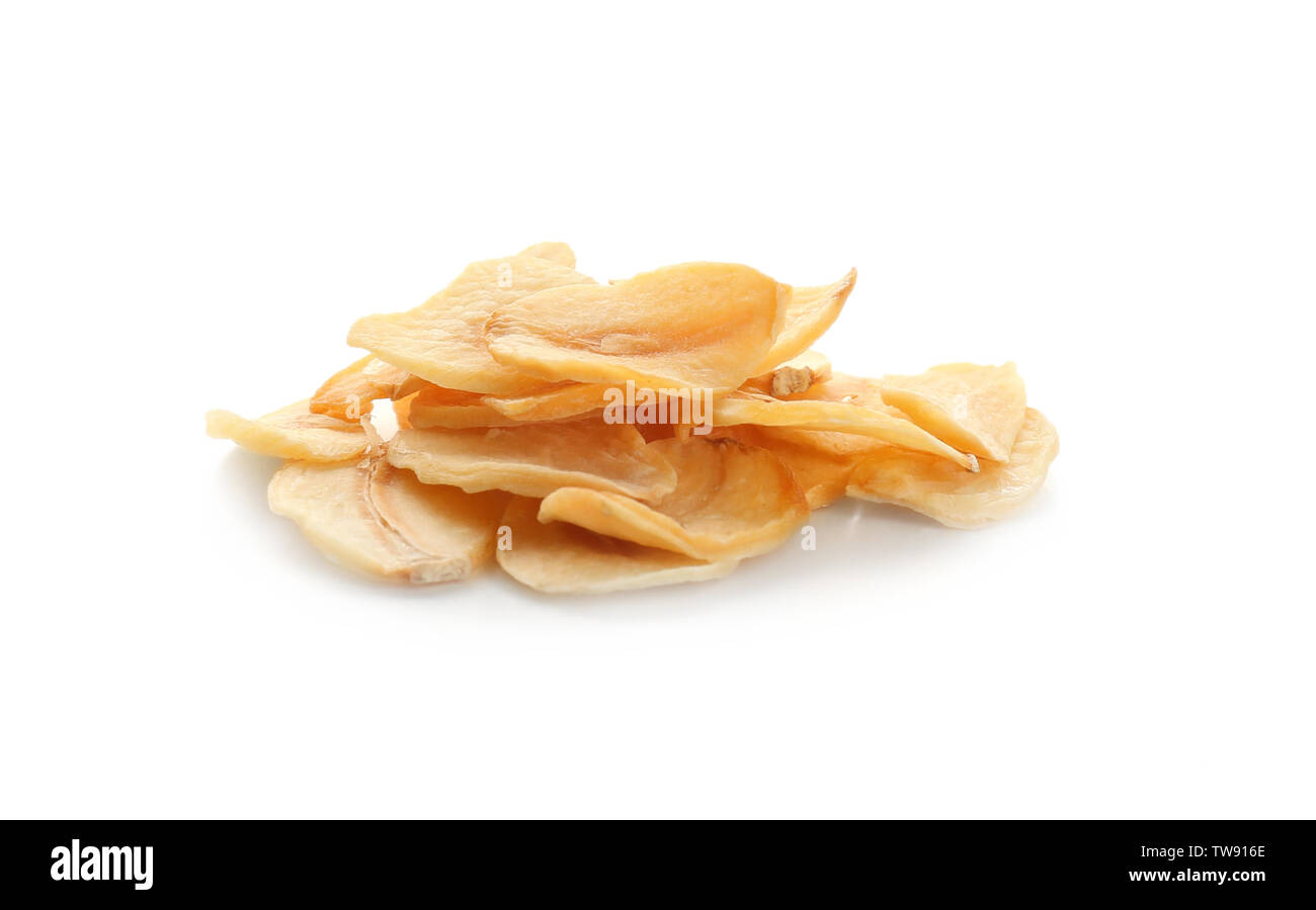 Dried garlic flakes on white background Stock Photo - Alamy