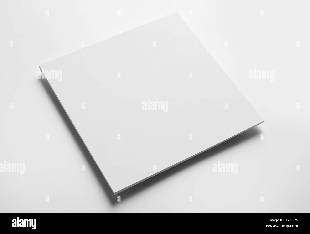Stacked sheets of paper on white background. Mock up for design Stock ...