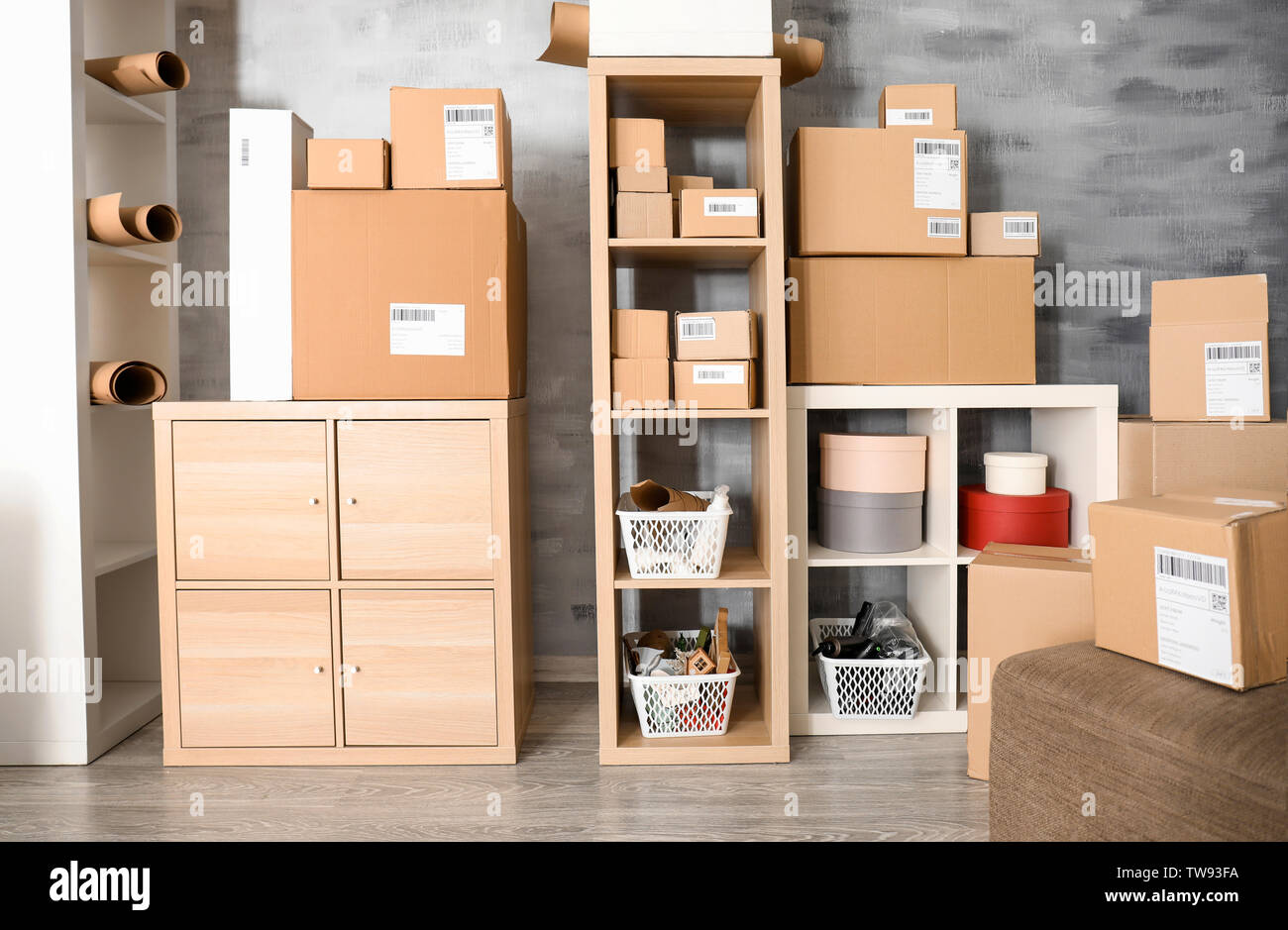 Parcels ready for shipment to customer, indoors Stock Photo - Alamy