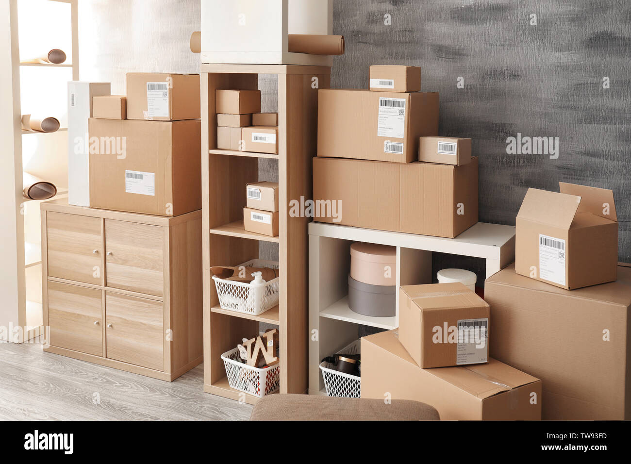 Parcels ready for shipment to customer, indoors Stock Photo - Alamy