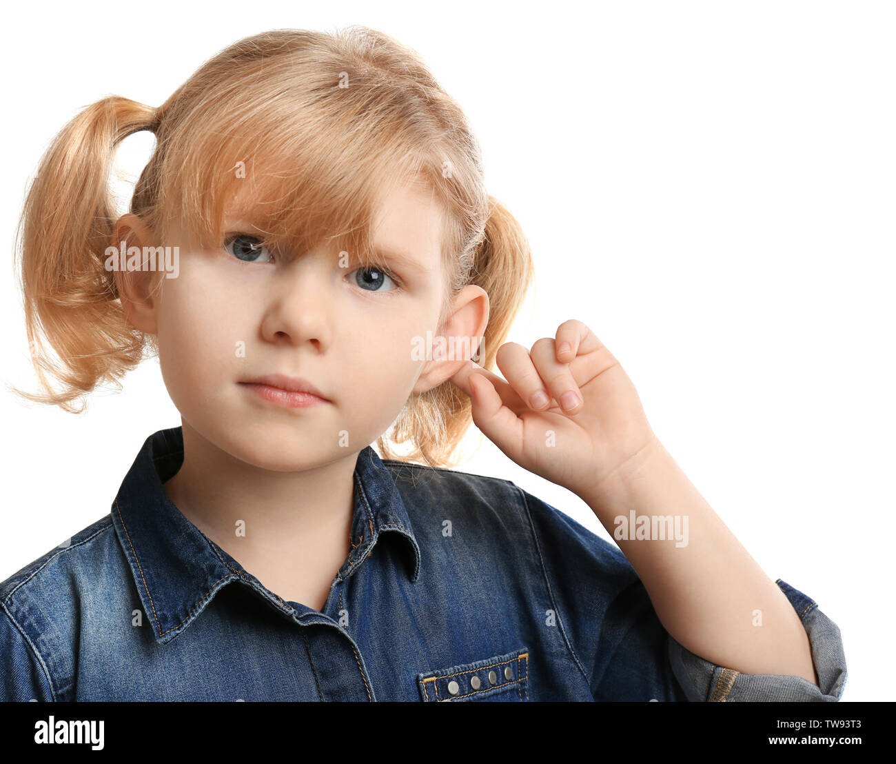 Cute little girl with hearing problem on white background Stock Photo ...