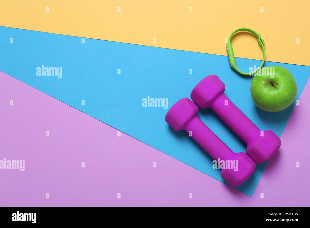Gym stuff and blank space for exercise plan on color background. Flat ...