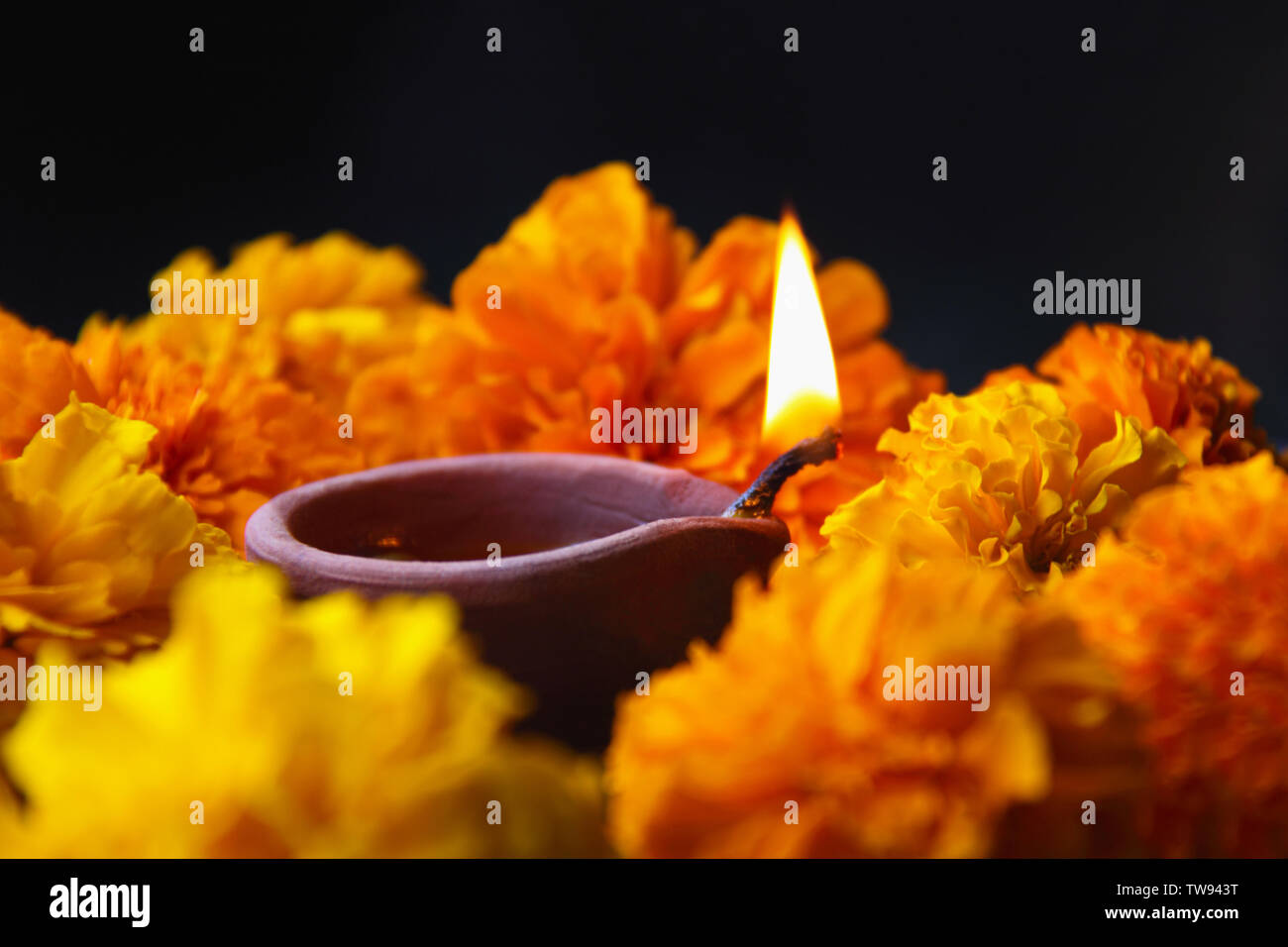 Close up of a burning oil lamp Stock Photo - Alamy