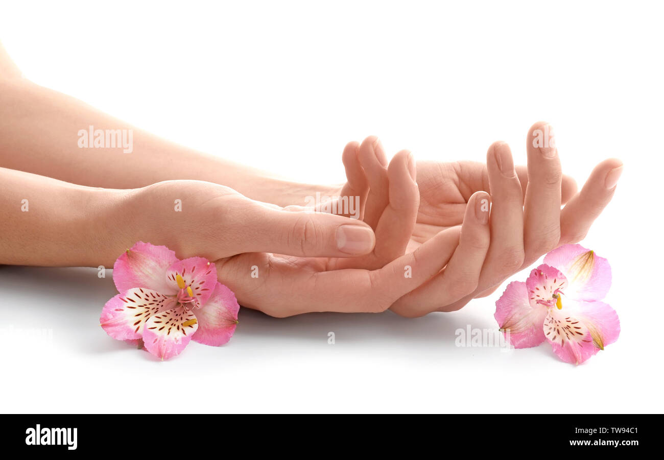 Young woman with soft skin after using of hand cream on white ...