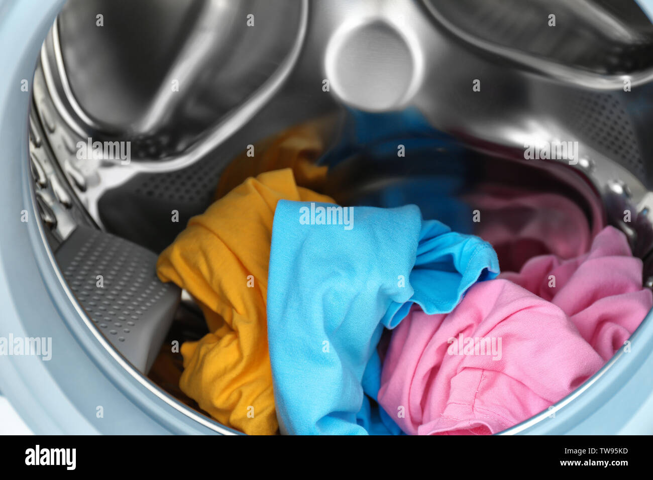 Laundry in washing machine, closeup Stock Photo - Alamy
