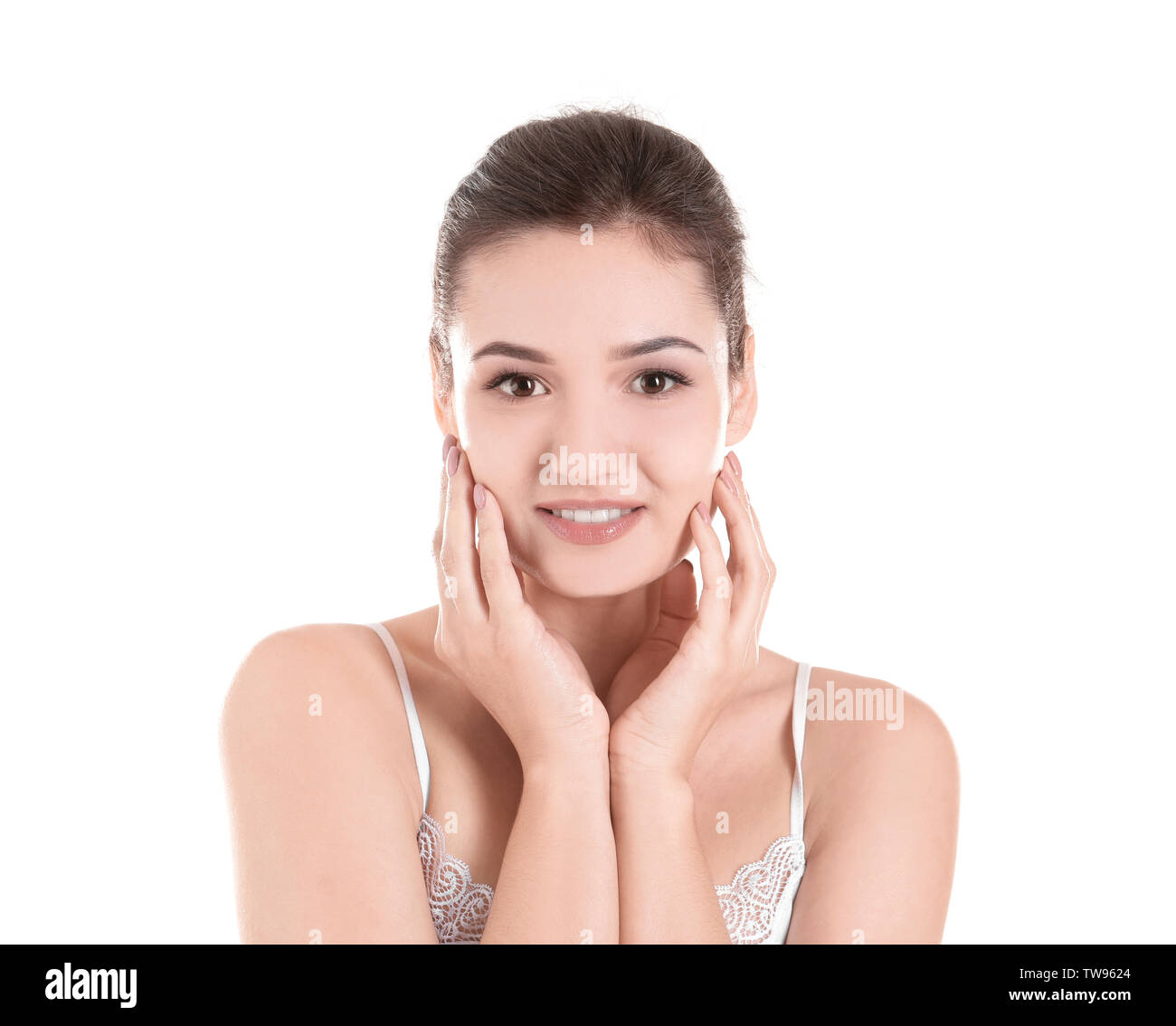 Attractive young woman with silky skin after applying cream on white ...