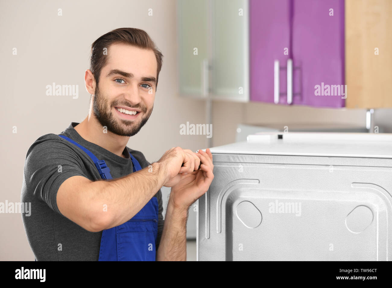 Man repairing device cooling hi-res stock photography and images - Alamy