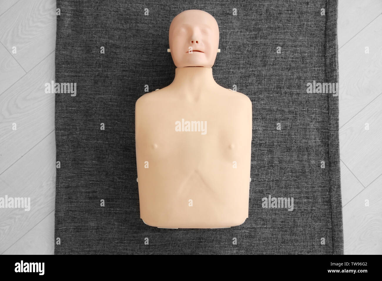 First aid mannequin on floor, top view Stock Photo - Alamy