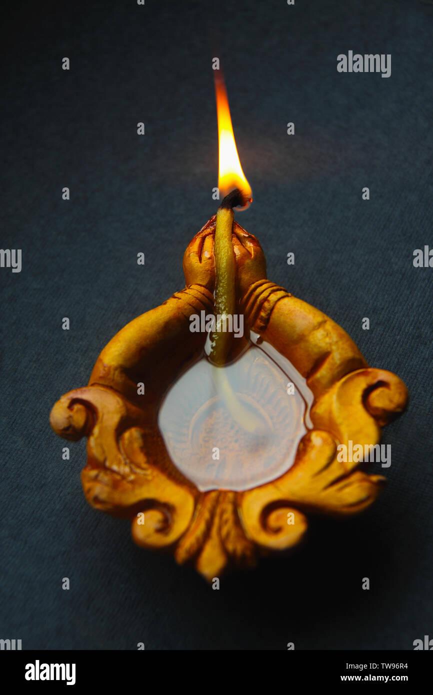 Burning diya lamp hi-res stock photography and images - Alamy