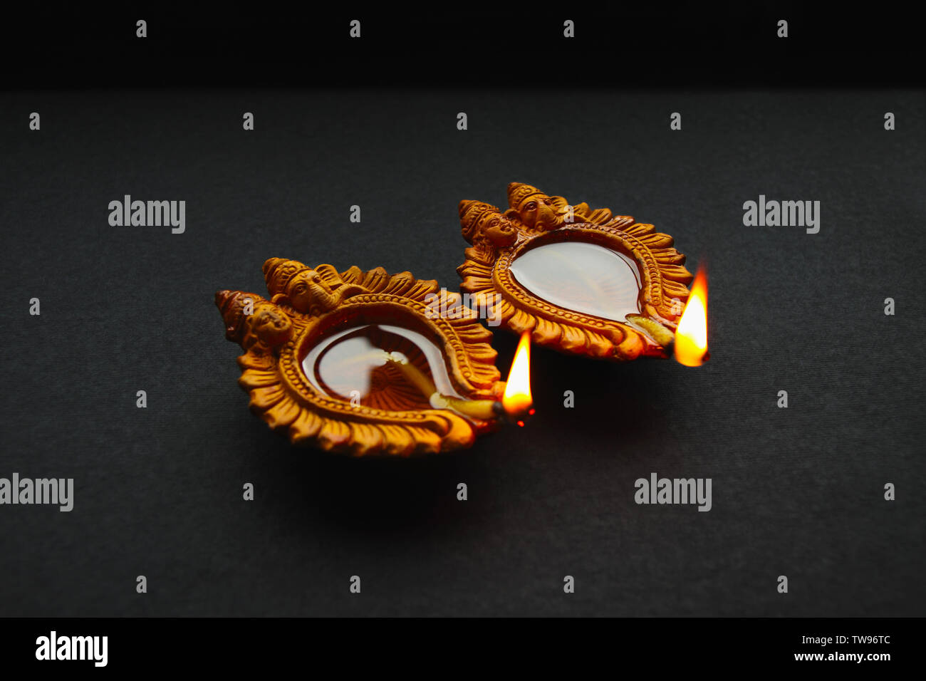 High angle view of burning diwali diyas Stock Photo - Alamy