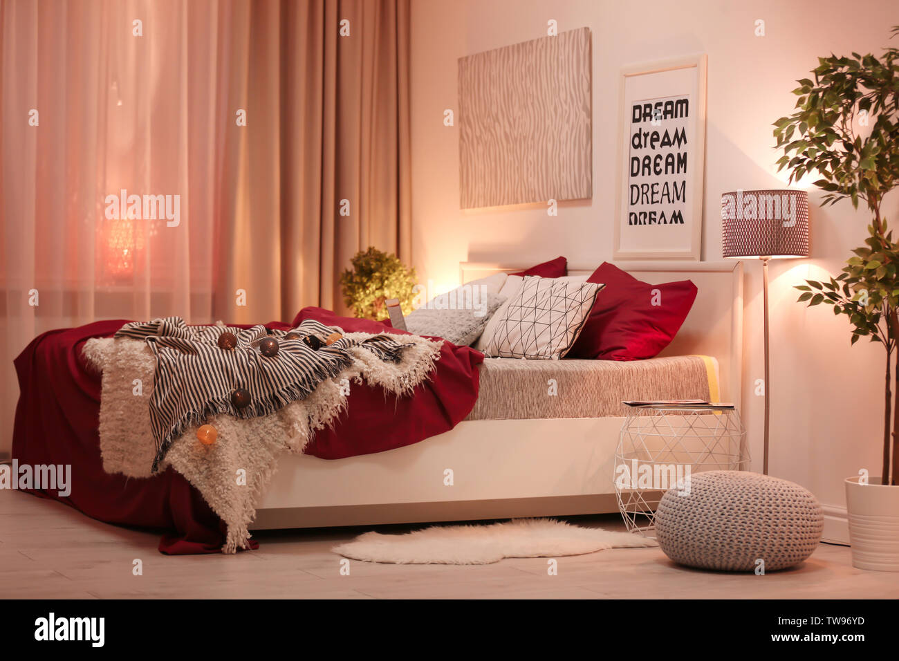 Modern room interior with comfortable bed Stock Photo - Alamy