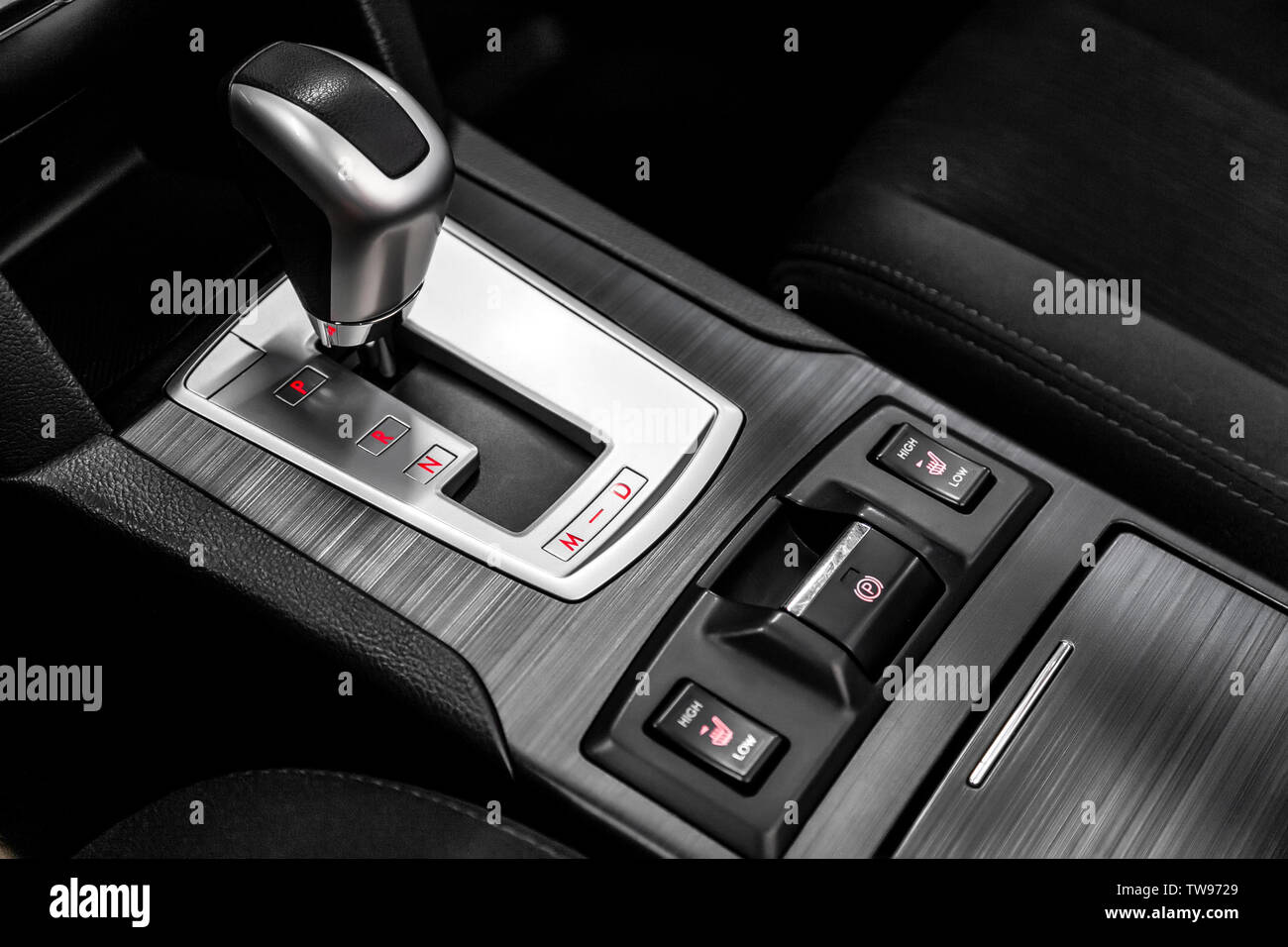 Close-up of the accelerator handle with silver metallic. automatic ...