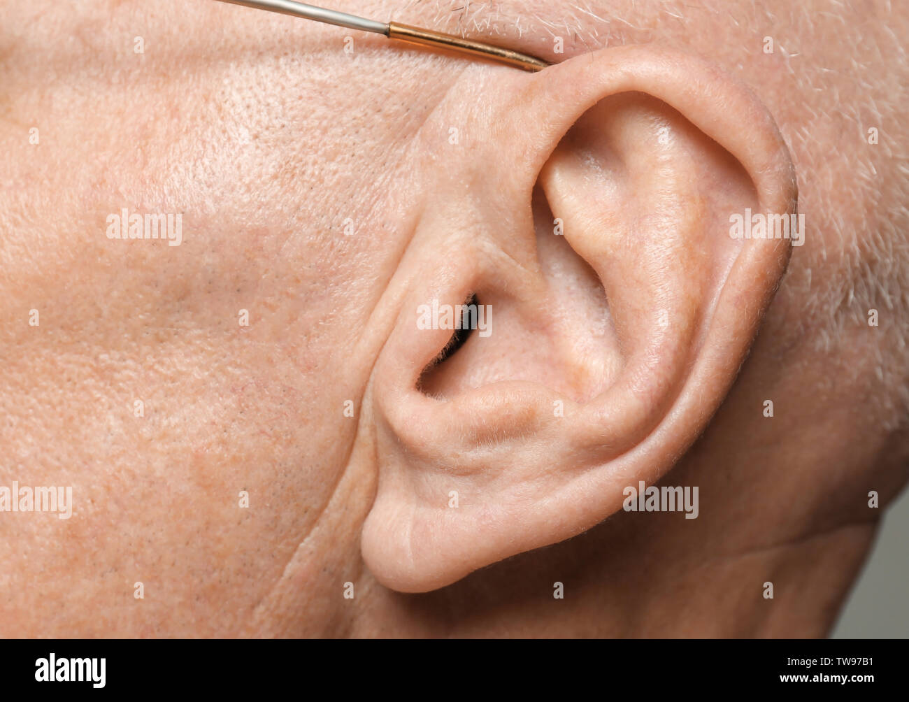Hearing aid man closeup ear hi-res stock photography and images - Alamy
