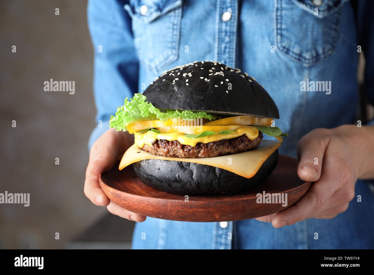 Black woman eat burger barbecue hi-res stock photography and images - Alamy