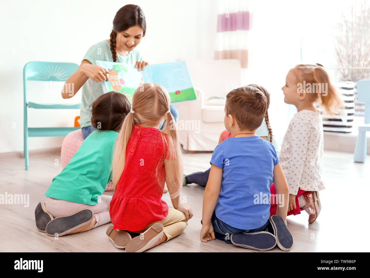 Teacher And Child Reading
