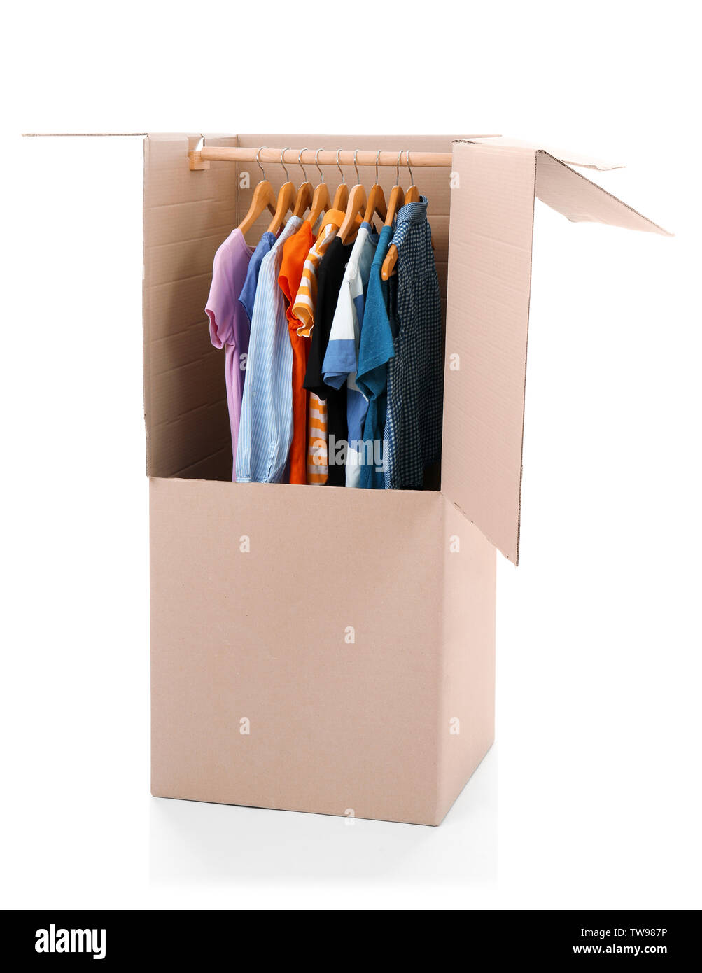 Wardrobe box with clothes on white background Stock Photo - Alamy
