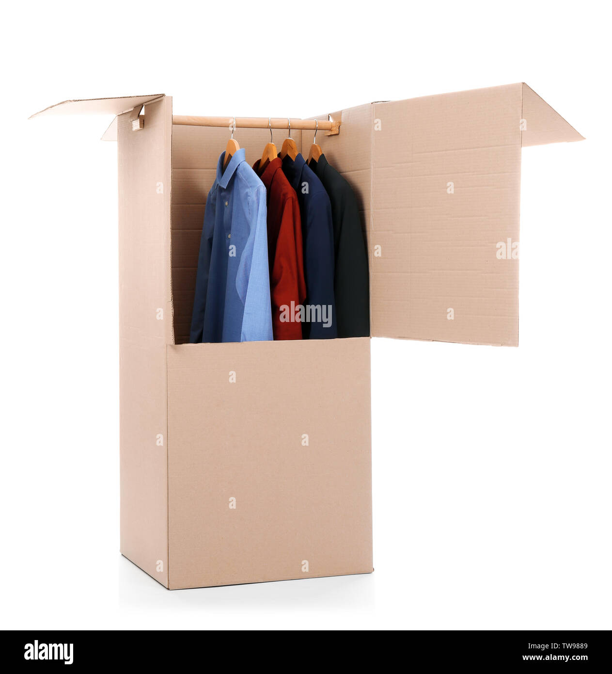 Wardrobe box with clothes on white background Stock Photo - Alamy