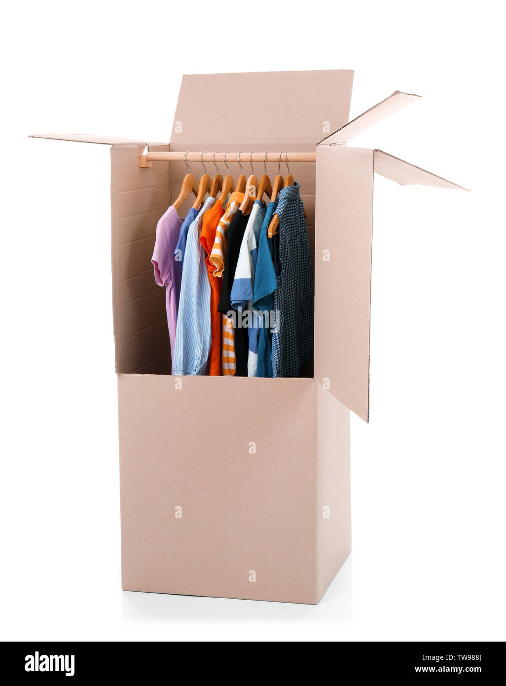 Wardrobe box with clothes on white background Stock Photo - Alamy