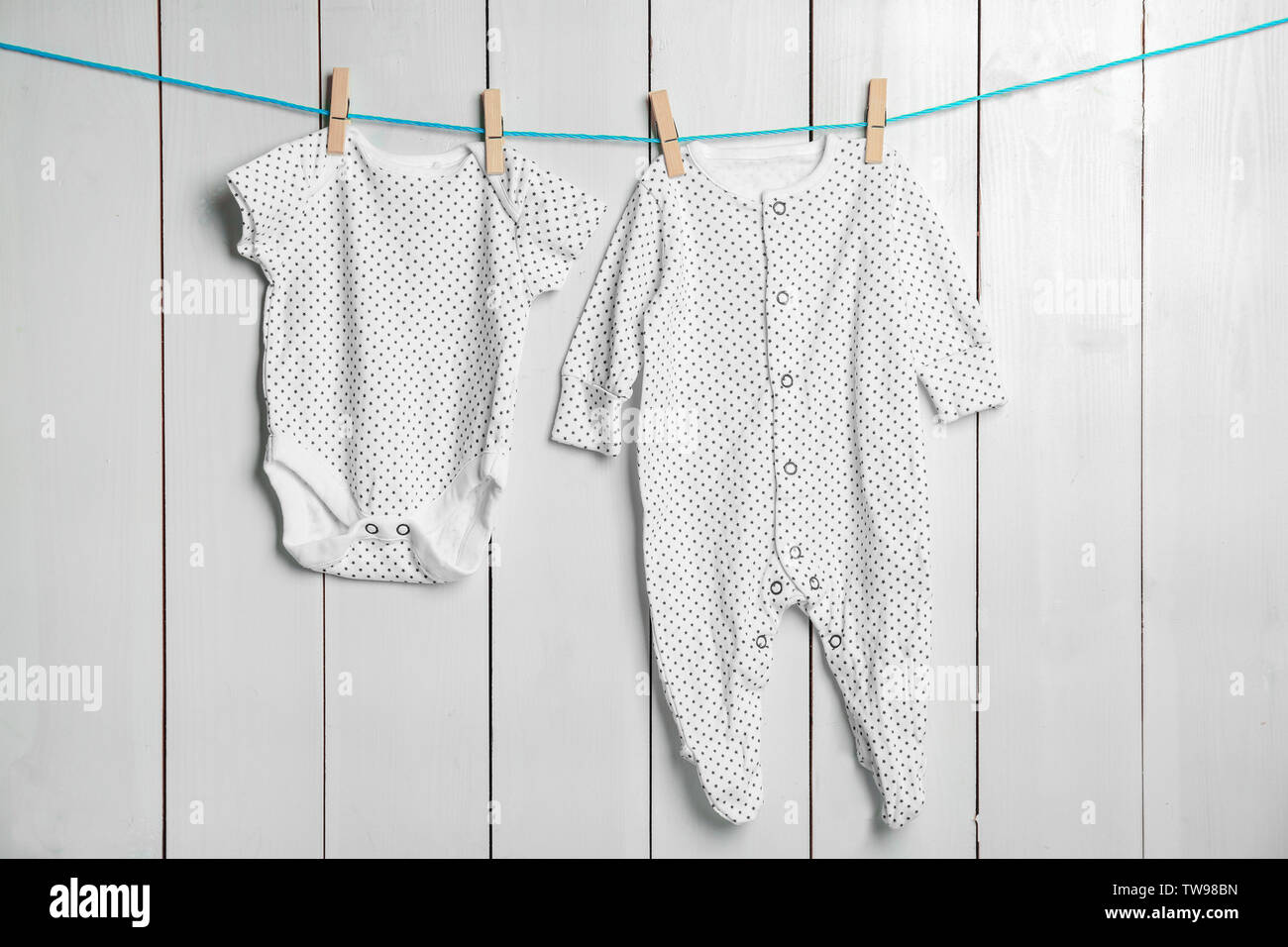 Children's clothes washing line hi-res stock photography and images - Alamy