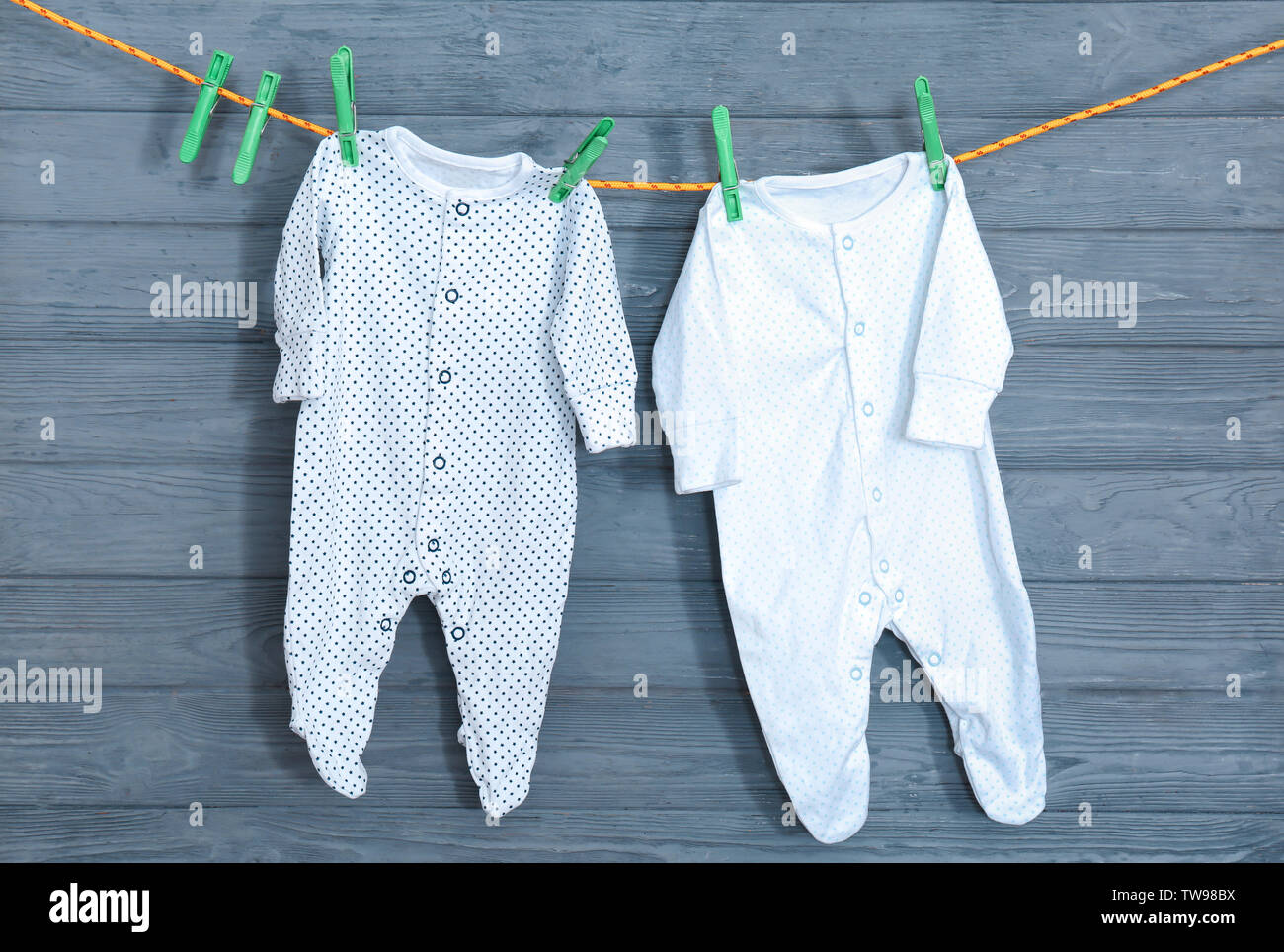 Children's clothes washing line hi-res stock photography and images - Alamy