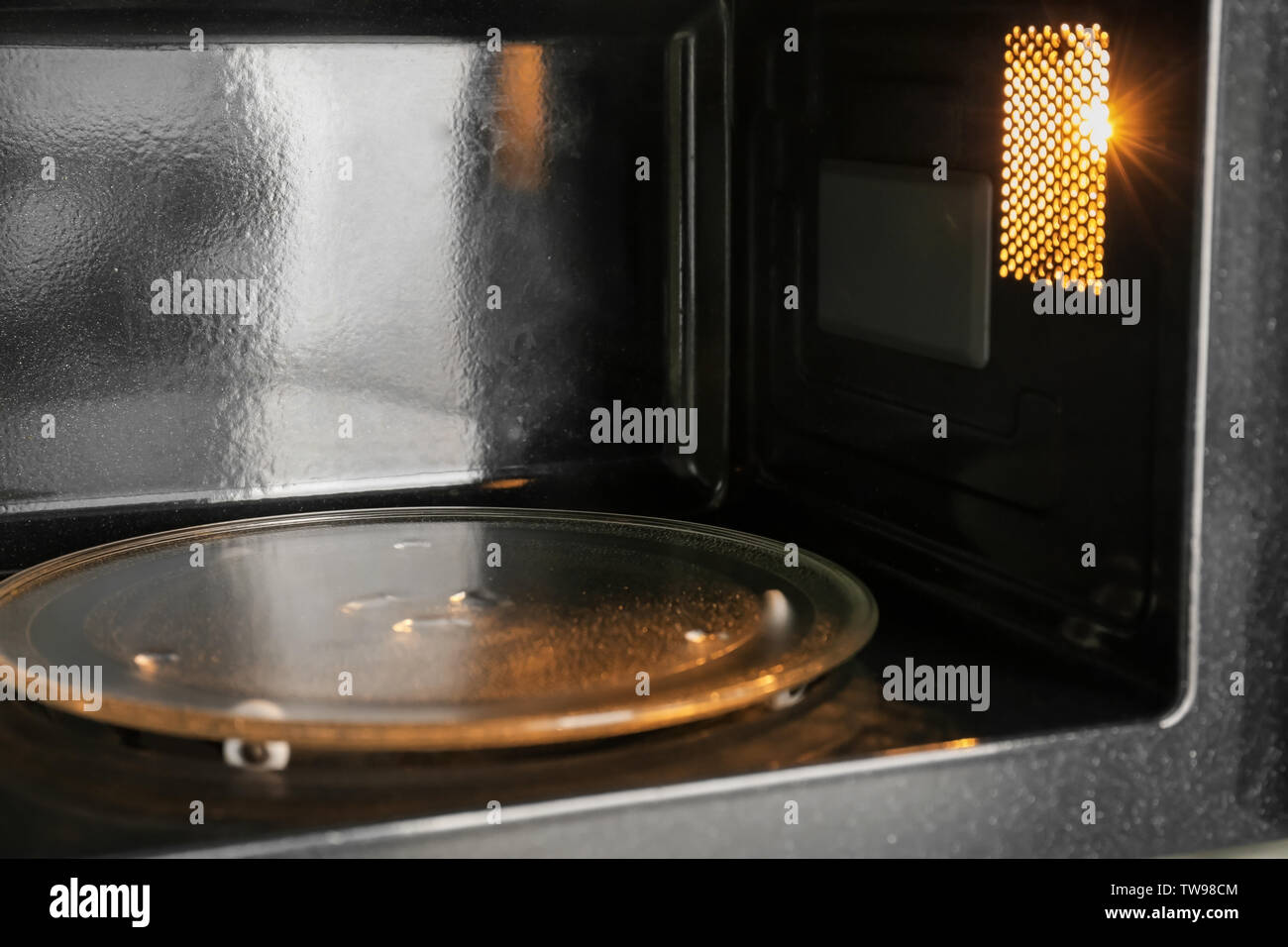 Modern empty microwave oven, closeup Stock Photo - Alamy