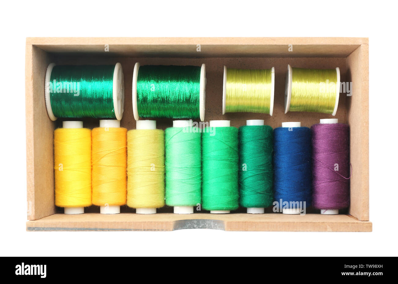 Box with colorful sewing threads on white background Stock Photo - Alamy