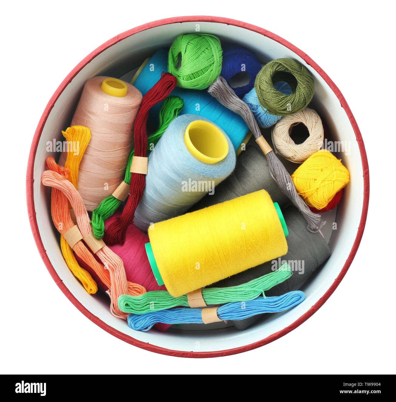 Round box with colorful sewing threads on white background Stock Photo ...