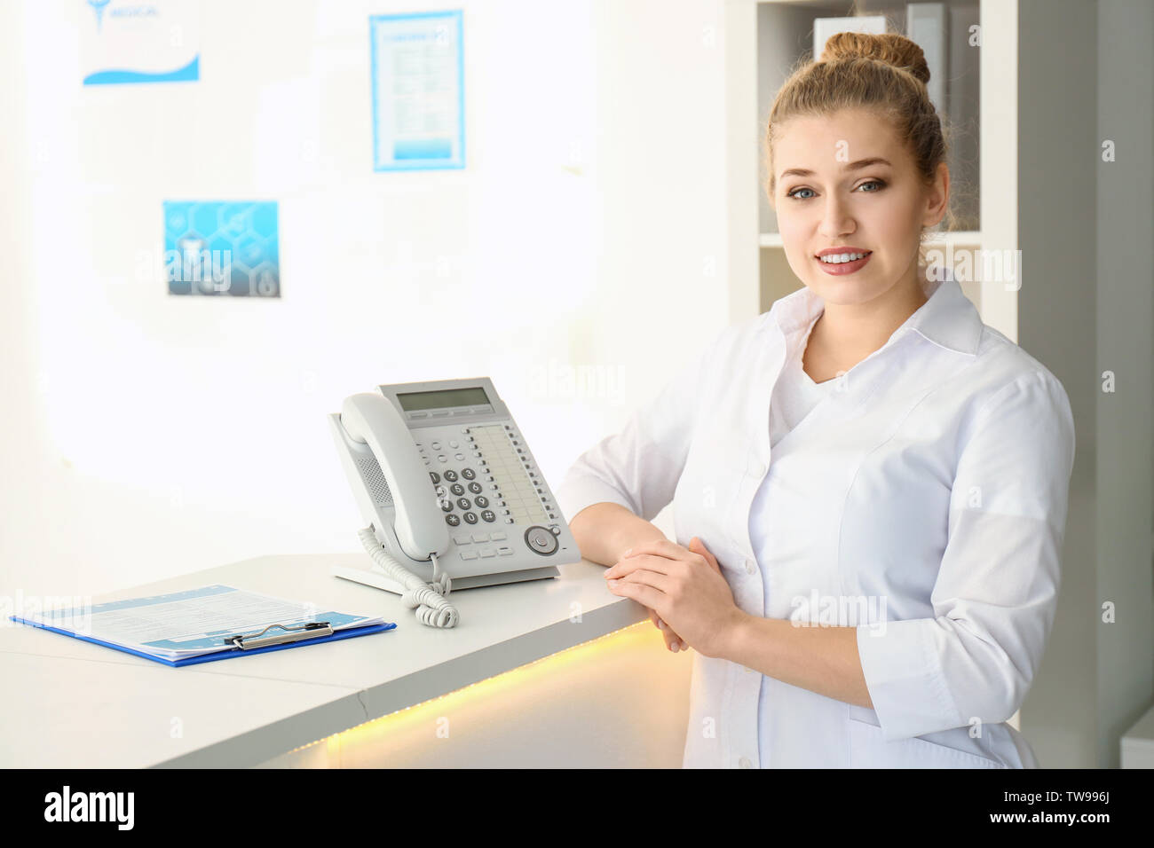 Portrait female hospital receptionist hi-res stock photography and ...