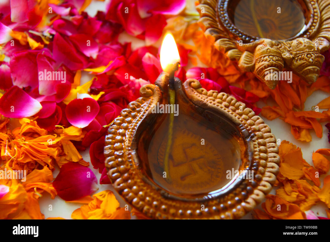 Close up of a burning diwali diya Stock Photo - Alamy
