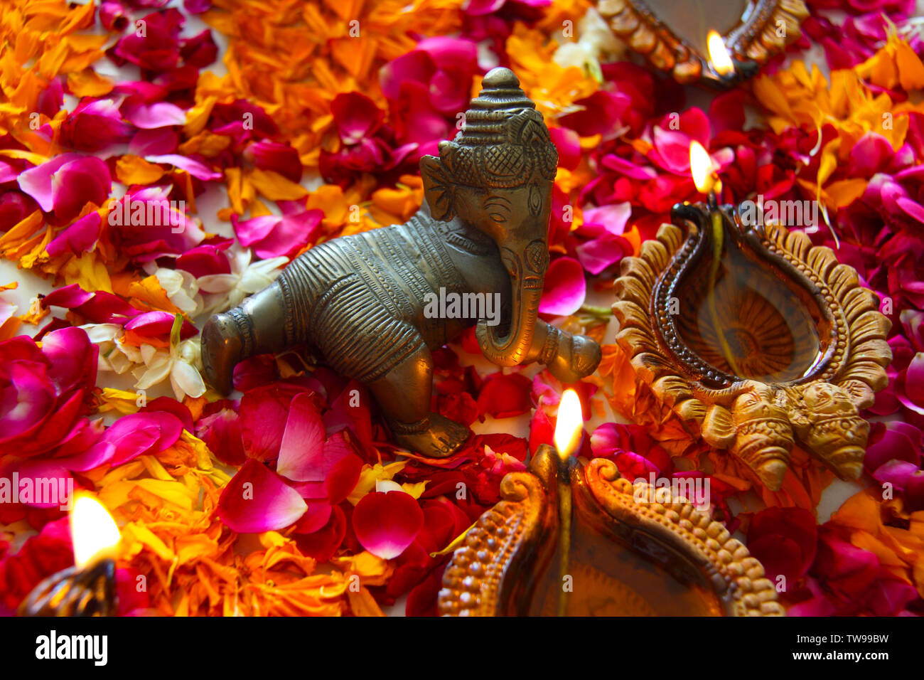 Statue of Lord Ganesha with diwali diyas Stock Photo - Alamy