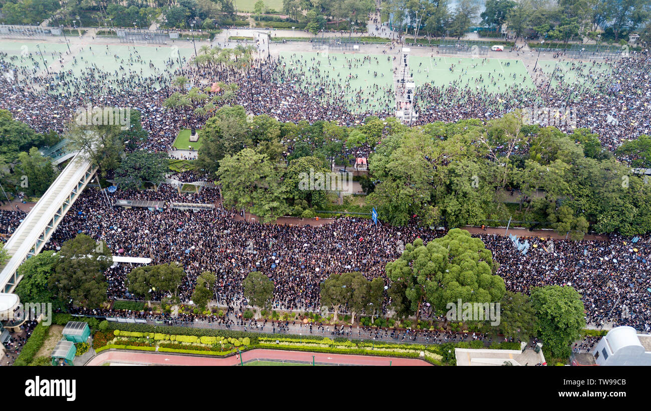 Aerial view of protesters marching in a mass protests rally from ...