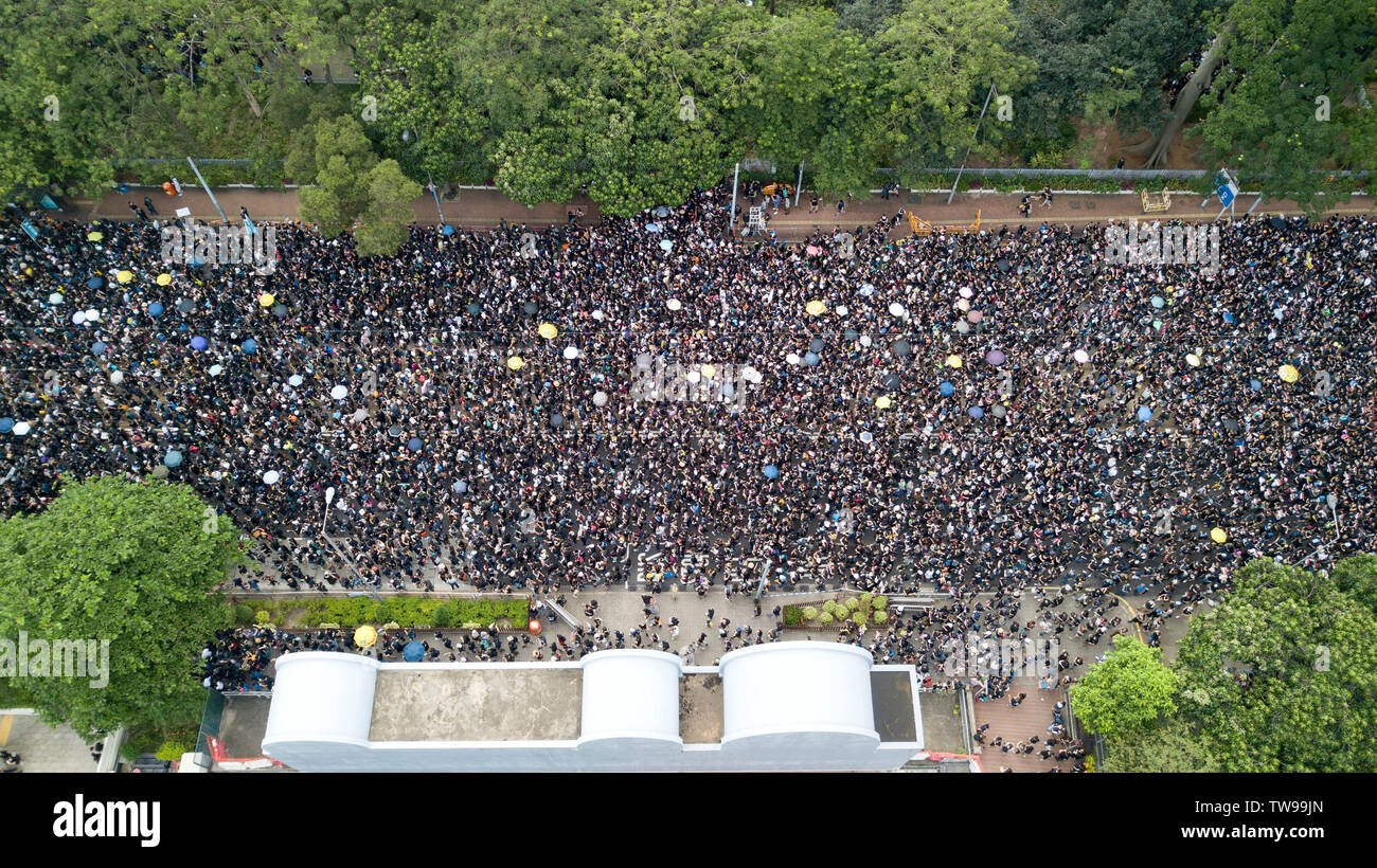 Aerial view of protesters marching in a mass protests rally from ...