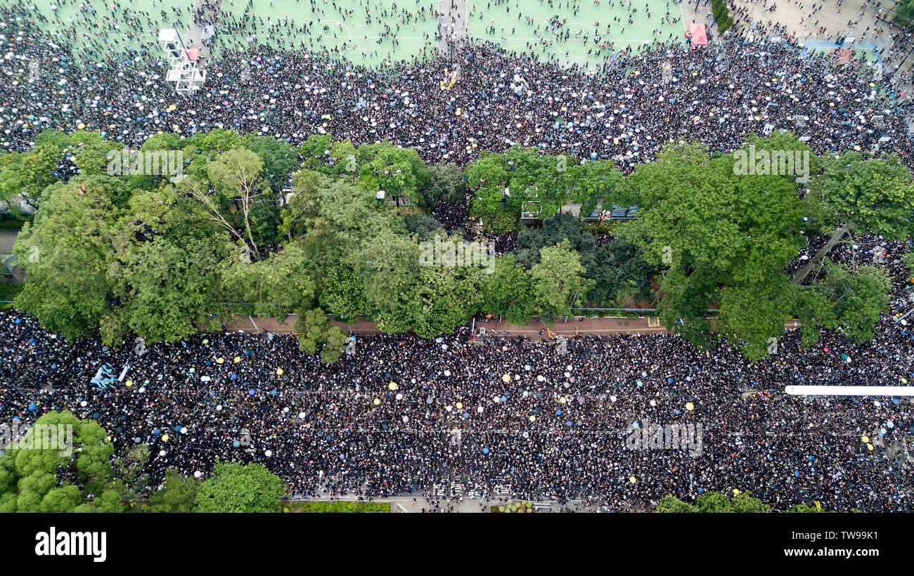 Aerial view of protesters marching in a mass protests rally from ...