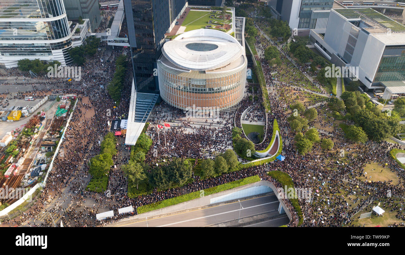 Aerial view of protesters marching in a mass protests rally from ...