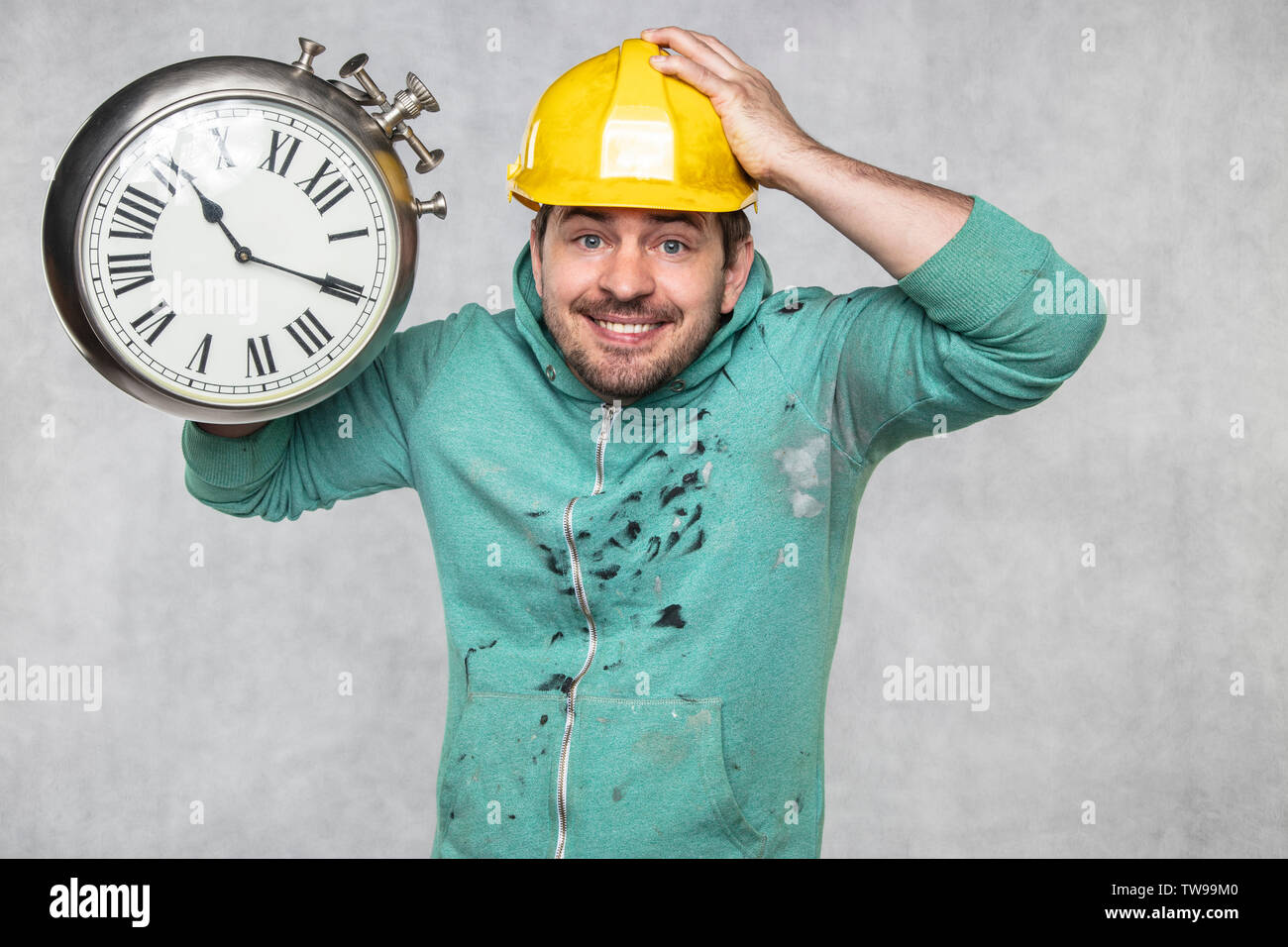 concept of time in matters of construction, builder and clock Stock ...