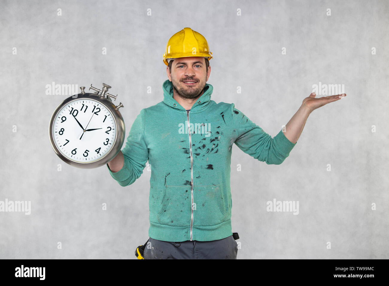 concept of time in matters of construction, builder and clock Stock ...