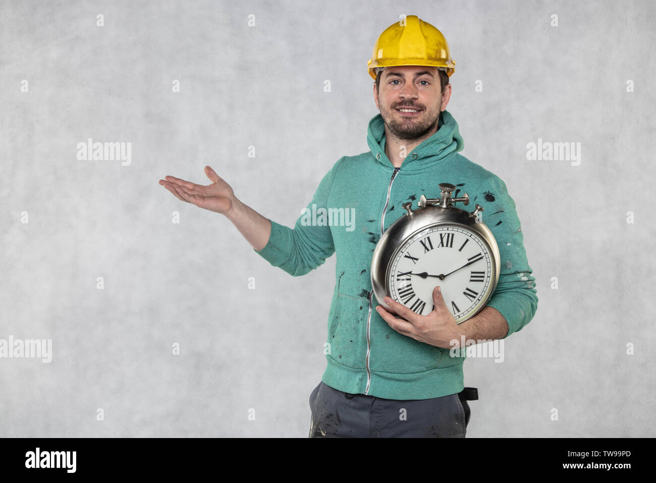 concept of time in matters of construction, builder and clock Stock ...