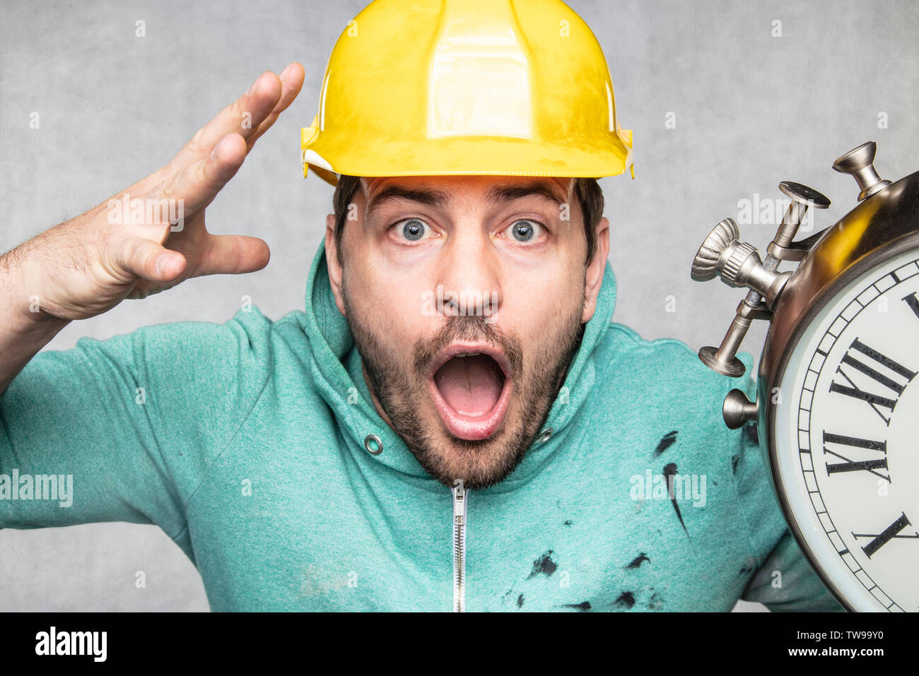 concept of time in matters of construction, builder and clock Stock ...