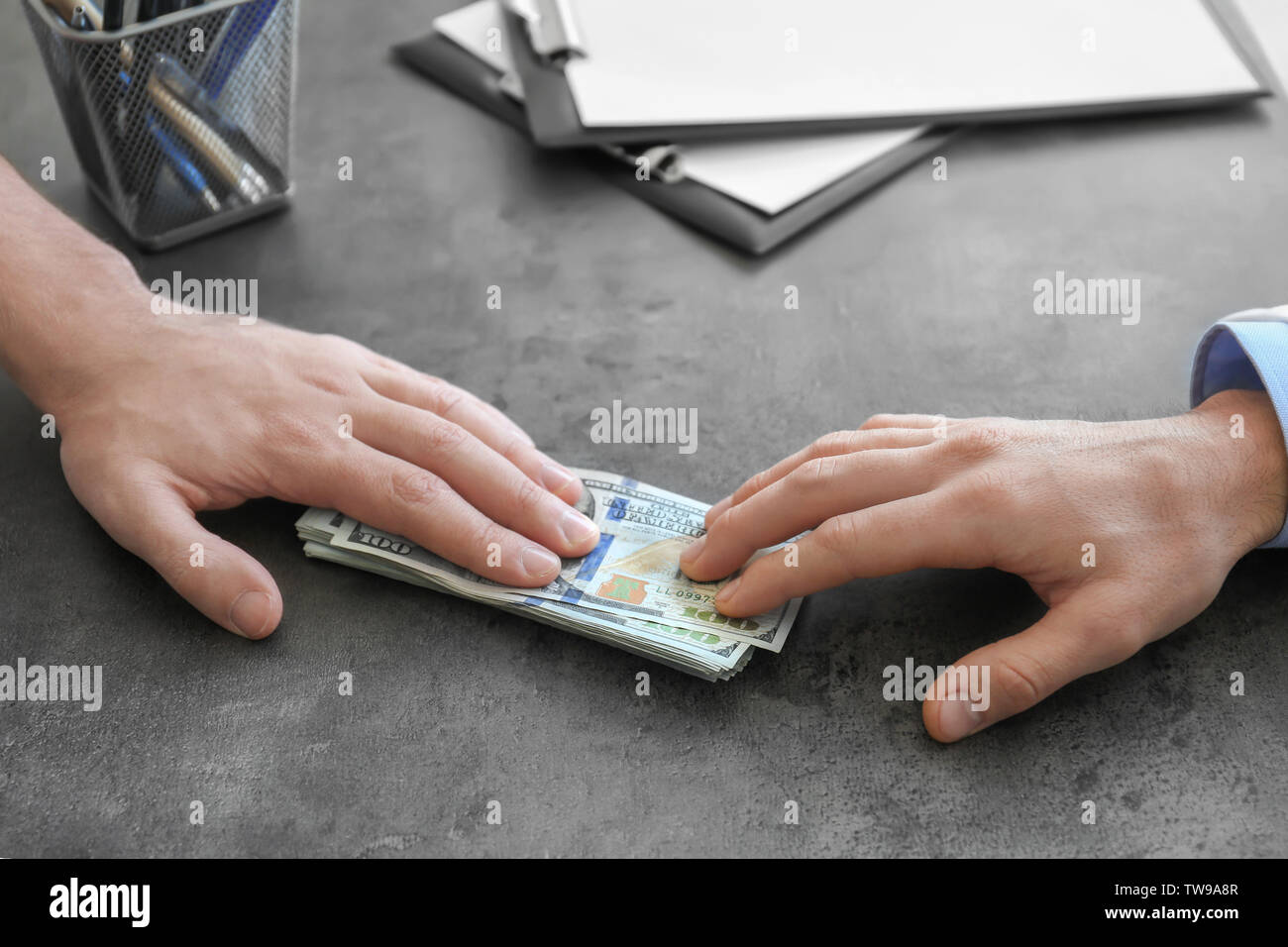 Doctor receiving bribe from hi-res stock photography and images - Alamy