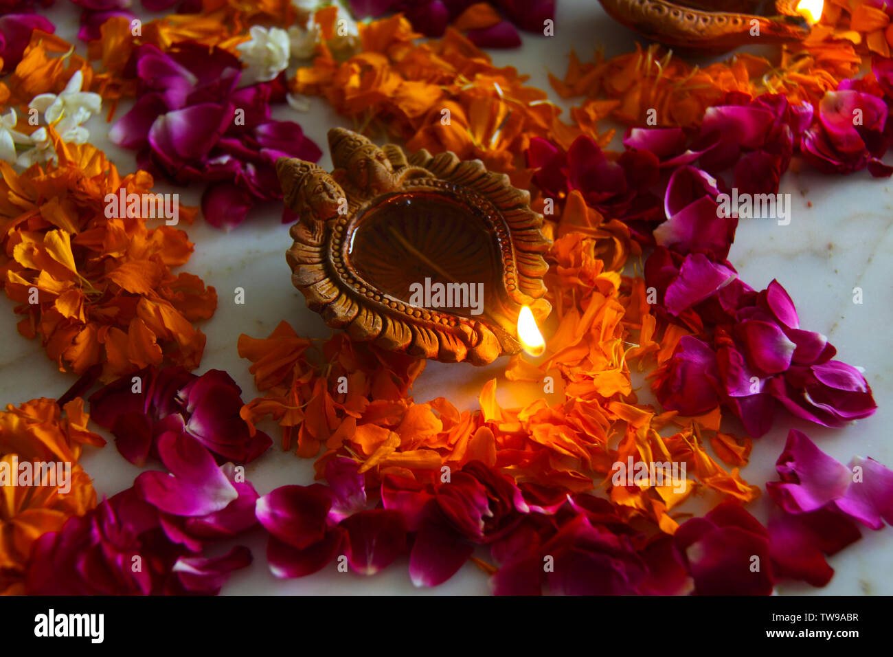 Burning earthen lamp hi-res stock photography and images - Alamy