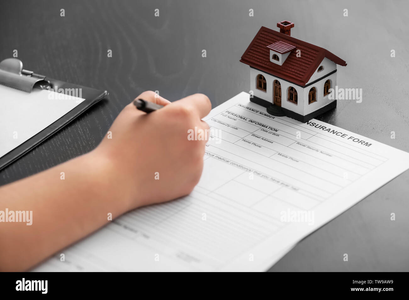 Form filling model house hi-res stock photography and images - Alamy