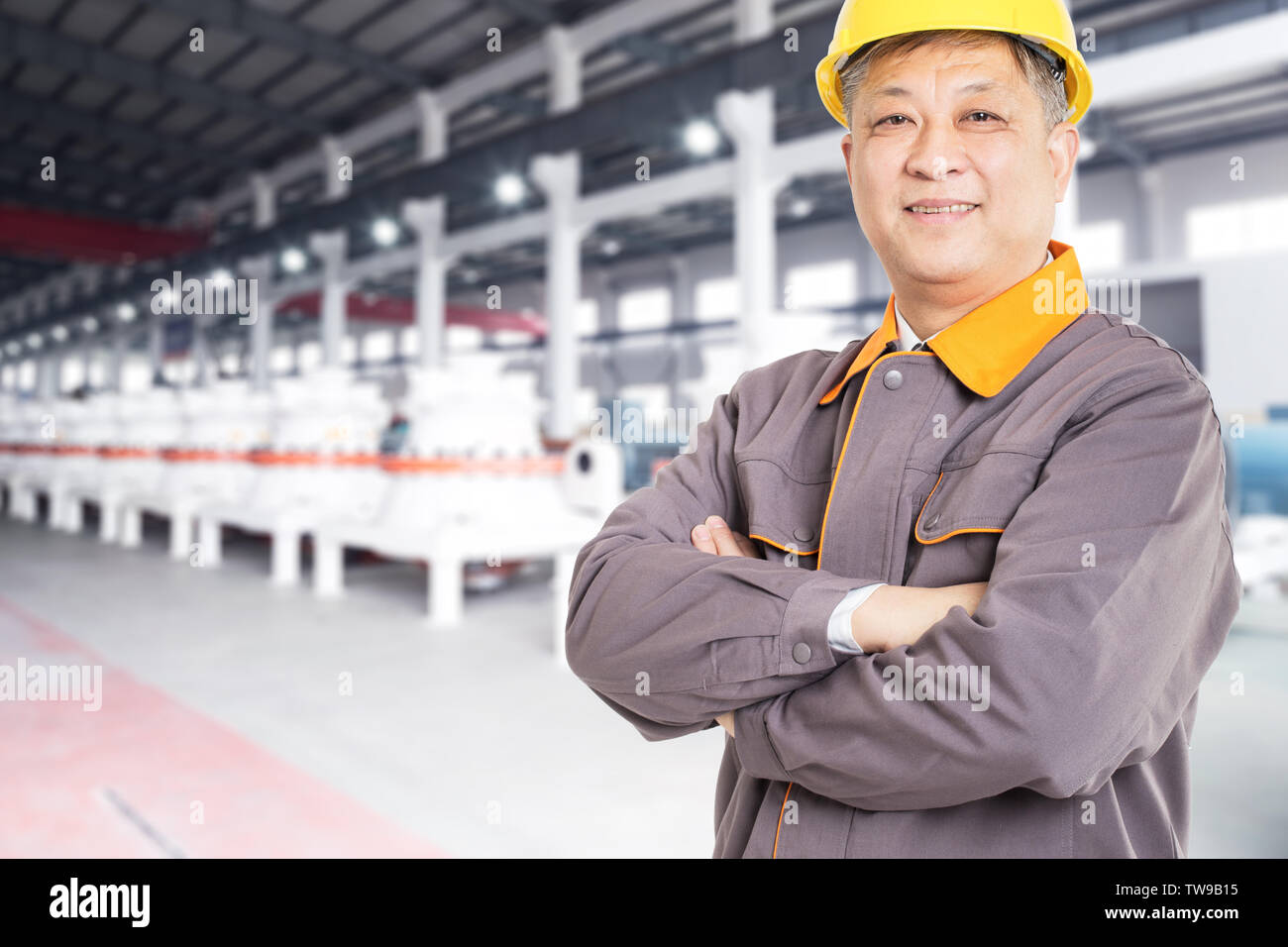 old asian man engineer in modern factory Stock Photo - Alamy