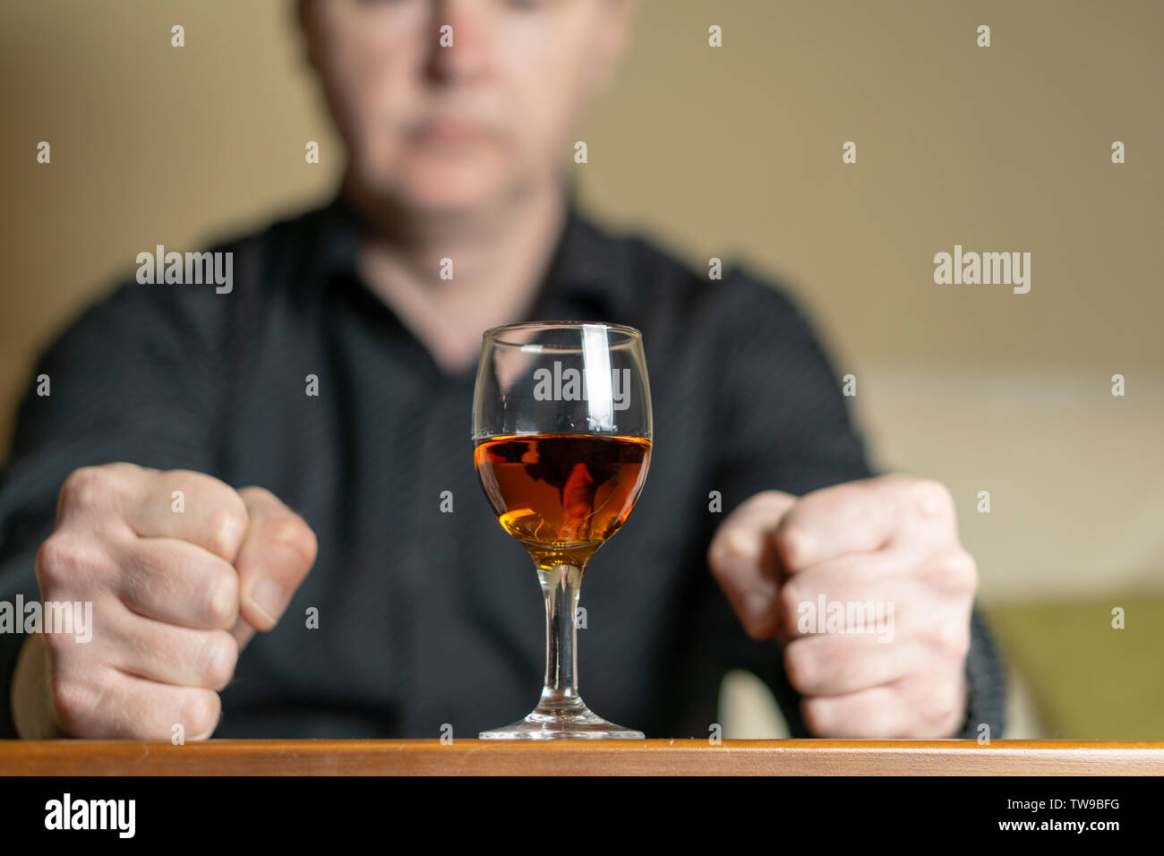 Exhausted businessman sits in office hi-res stock photography and ...