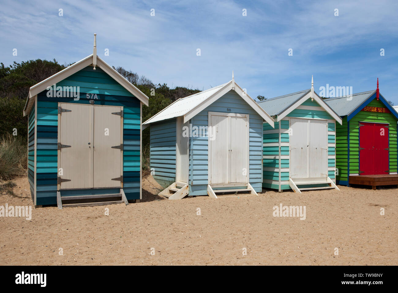 The bright and charming bathing boxes on Brighton Beach, Victoria ...