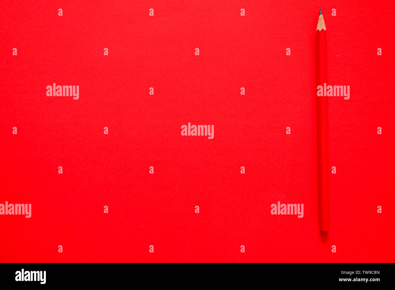 Close Up Wood Red Colored Pencil Single Object on Blank Red Paper ...