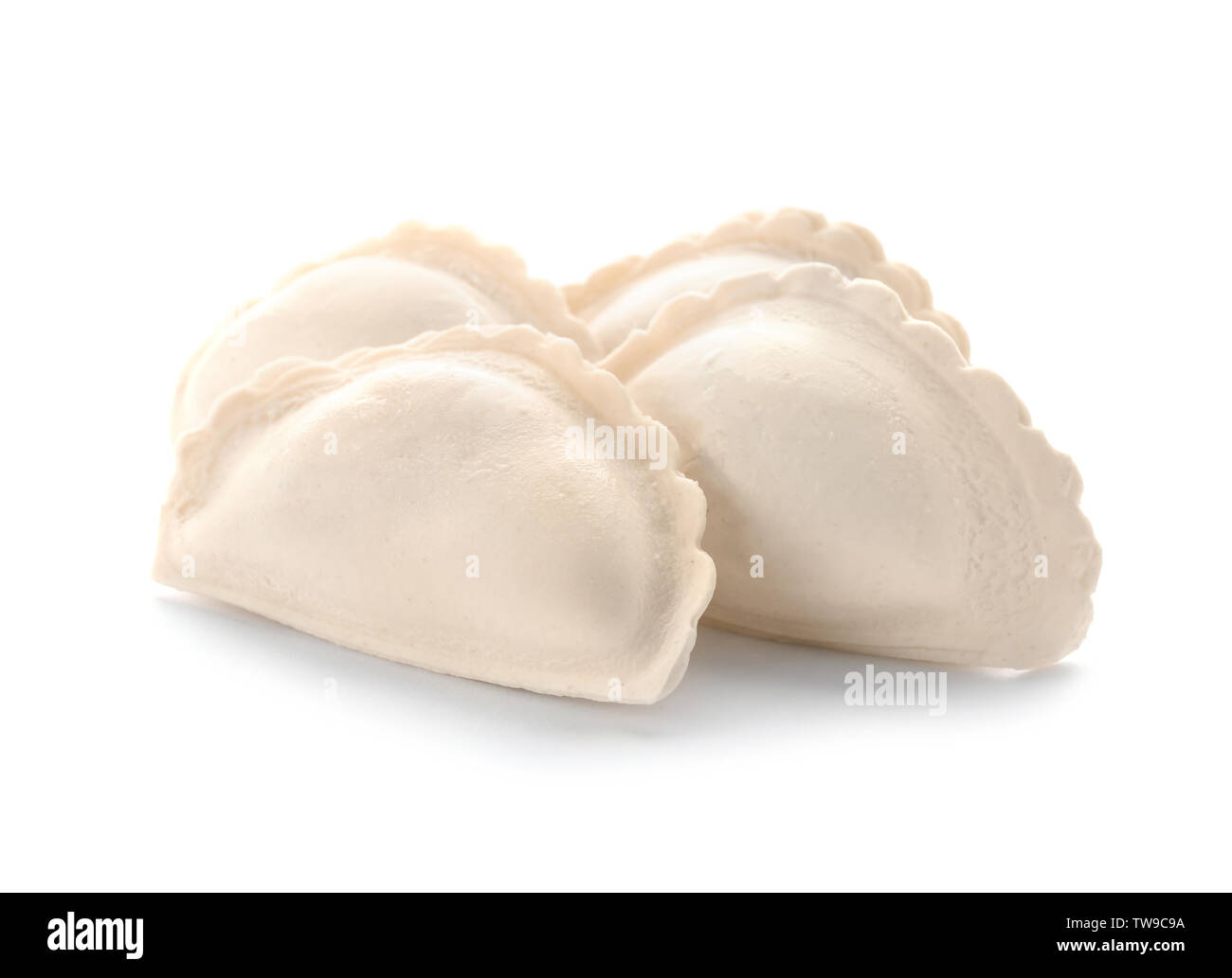 Raw dumplings on white background Stock Photo - Alamy