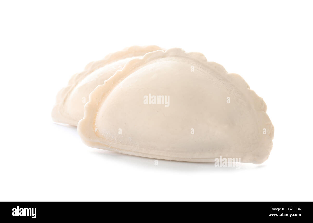Raw dumplings on white background Stock Photo - Alamy