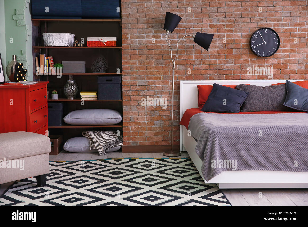 Cozy room interior with comfortable bed Stock Photo - Alamy